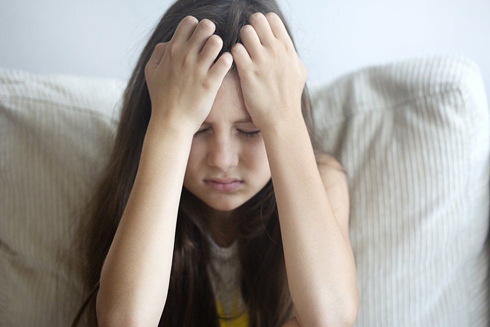 Should I be concerned about my child's headache? - Flourish